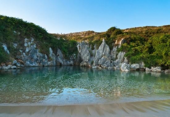 Discovering Playa De Gulpiyuri: A Hidden Gem On Spain's Nort...
